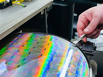 Optics & Photonics News - NIST and AIM Photonics Target Faster PICs