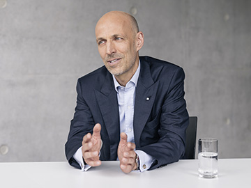 Optics & Photonics News - A Conversation with Peter Leibinger