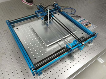 Optics & Photonics News - Computer-Guided Drawing Machine Fabricates ...
